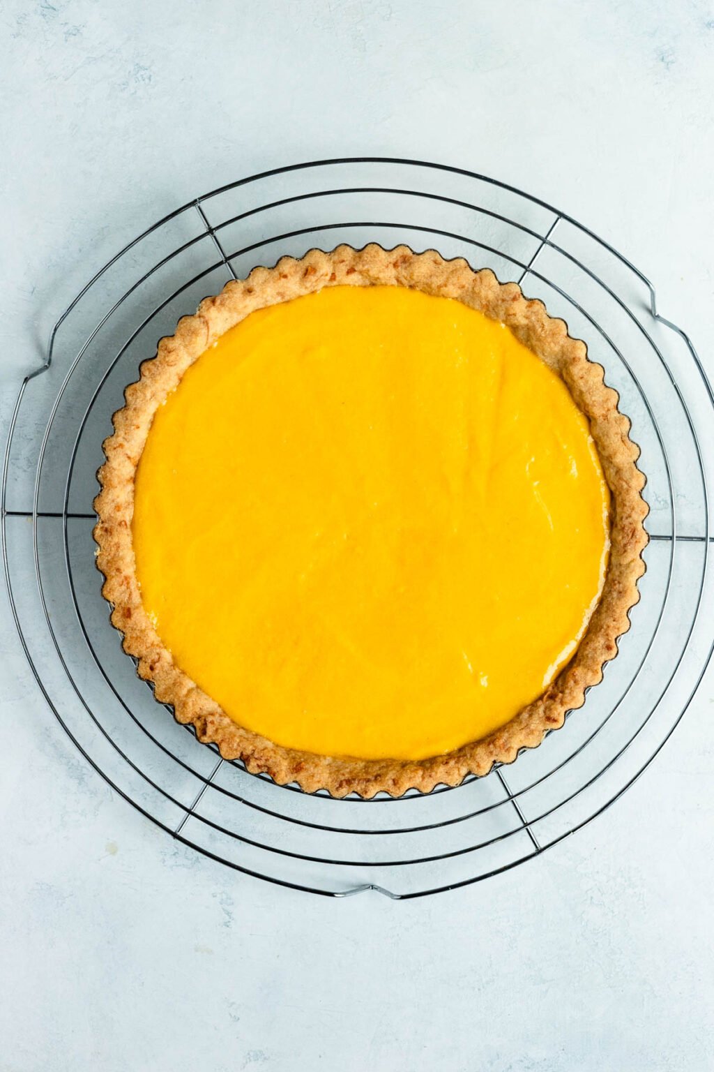 Mango Curd Tart with a Coconut Crust - Bakes by Brown Sugar